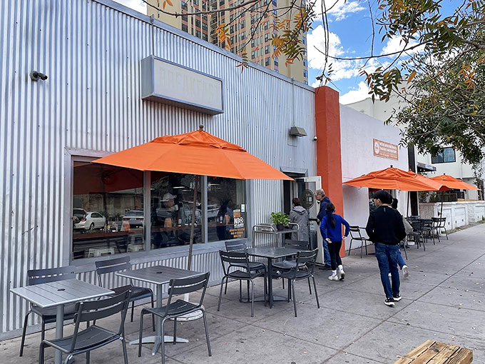 The sidewalk seating offers Phoenix sunshine with your breakfast, those orange umbrellas providing just enough shade to keep your maple syrup from overheating.