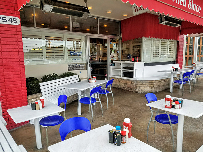 Outdoor seating with blue chairs lets you enjoy your eggs in the California sunshine, which should be mandatory everywhere.
