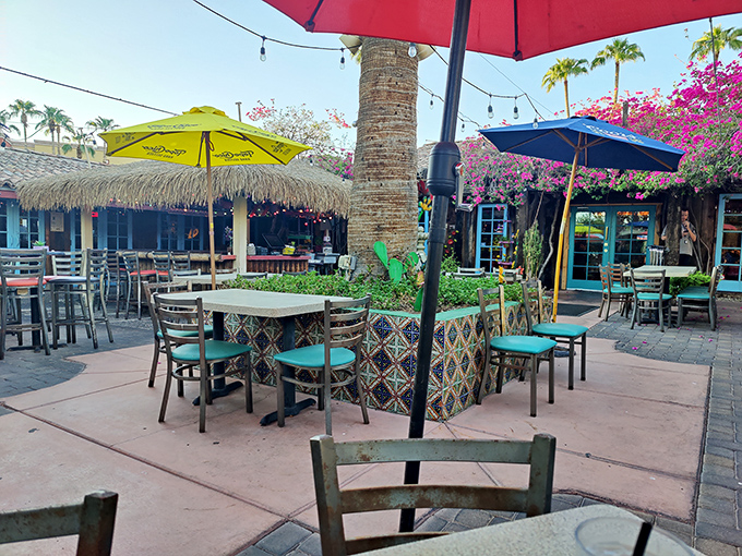 The outdoor dining area, where desert breezes, colorful umbrellas, and the scent of sizzling fajitas create the perfect Arizona afternoon.