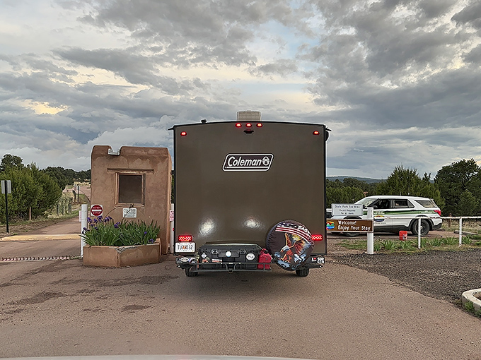 The gateway to adventure—where your RV signals you've officially left everyday stress behind at the Bluewater Lake entrance.