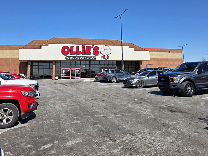 The parking lot view that signals your wallet is about to get a much-needed break. Bargain paradise awaits beyond those red doors.