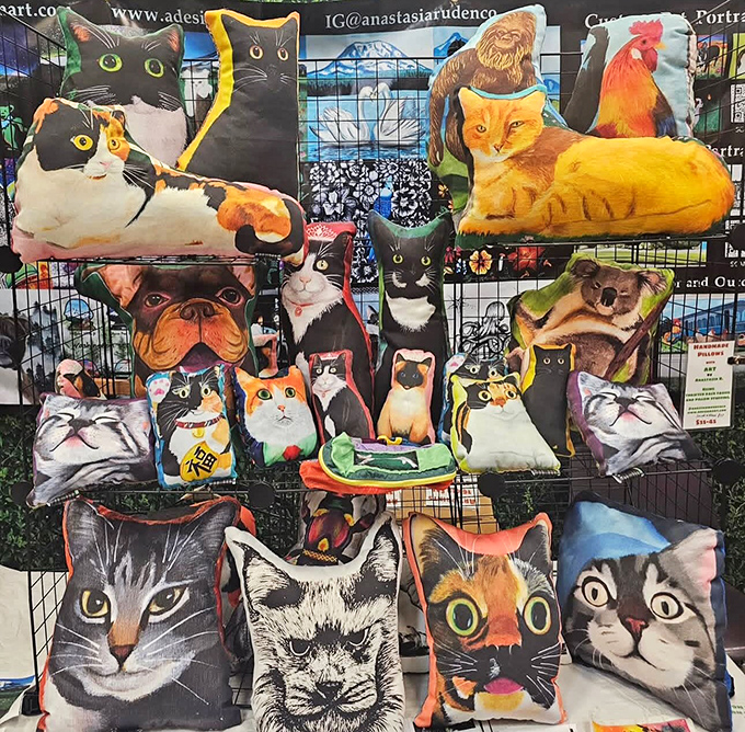 Feline-themed pillows galore&mdash;because nothing says "discerning decorator" quite like a tactical deployment of cat faces.
