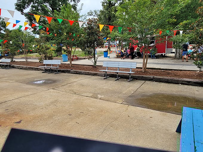 The strategic rest zone. These benches aren't just seating&mdash;they're command centers for people-watching, deal-planning, and essential snack consumption.