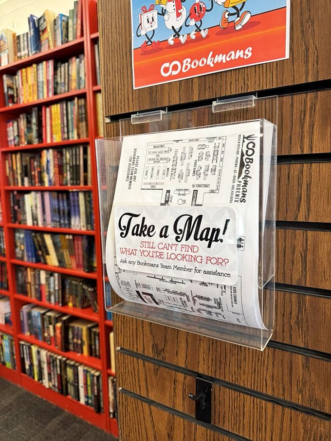 Take a Map! The sign says it all. Even treasure hunters need navigation help in this literary labyrinth of possibilities.
