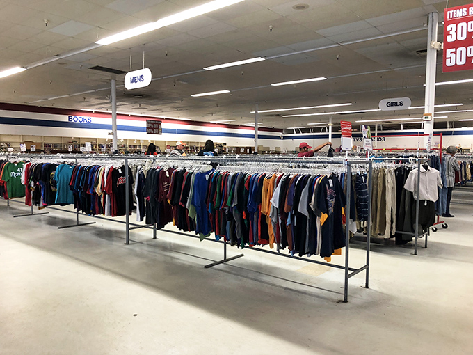 Color-coded clothing racks making organization look easy, like a rainbow decided to become a wardrobe consultant professionally.