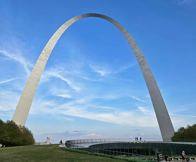 The Gateway Arch, impossibly slender yet monumentally strong, curves against a perfect blue sky&mdash;630 feet of stainless steel optimism pointing toward infinite possibilities.