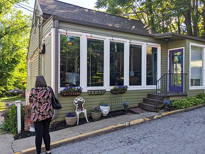 The Vineyard's Restaurant's charming cottage exterior with flower boxes promises comfort food with a view – the culinary equivalent of a warm hug.