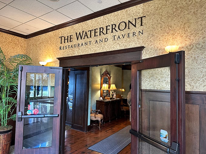 The Waterfront Restaurant's elegant entrance sets the stage for upscale dining with river views that would cost triple in Chicago but taste twice as good here.