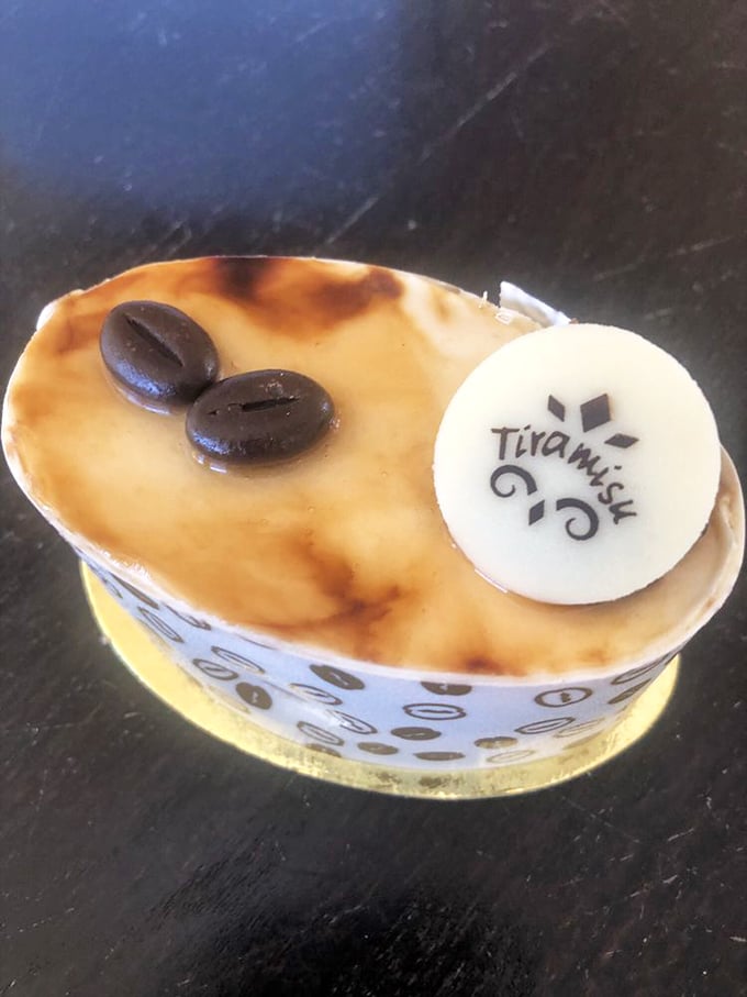 Tiramisu that transports you straight to Italy without the jet lag. Those coffee beans aren't just decoration&mdash;they're a promise of the flavor inside.