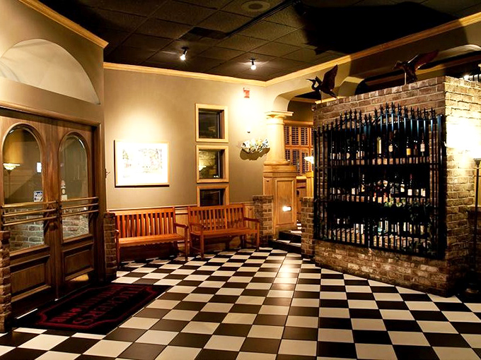The waiting area's checkerboard floor and wine display hint at Tucker's perfect balance of casual comfort and dining sophistication.