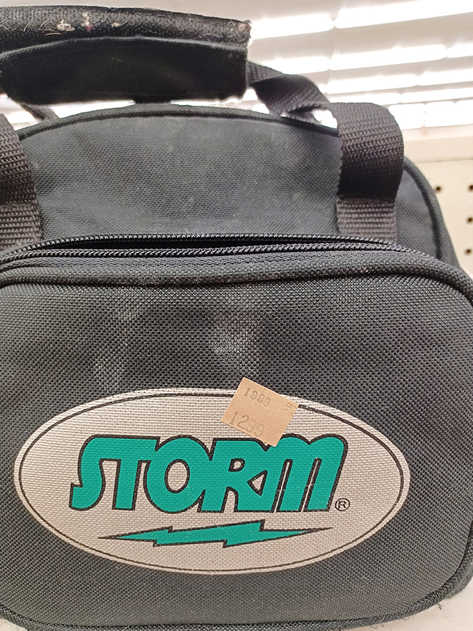A vintage Storm bag with more '90s attitude than a Nirvana concert. Someone's forgotten gym bag becomes another's retro statement piece.