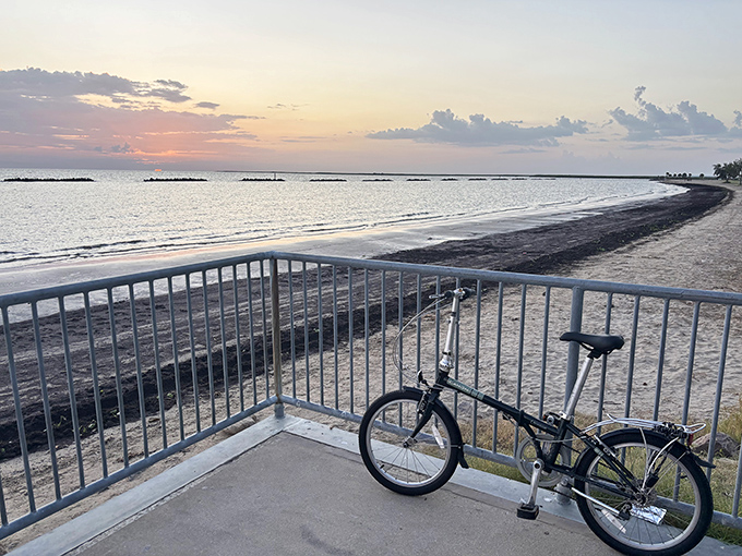 Sunset cyclists know the secret – there's no better way to end the day than pedaling alongside this golden-hour masterpiece.