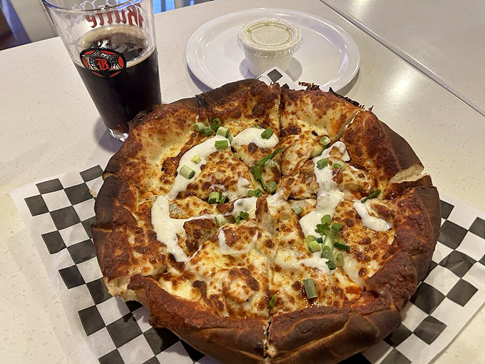 Buffalo chicken pizza: where wing sauce meets pizza perfection in a creation that makes you wonder why you ever ordered them separately.