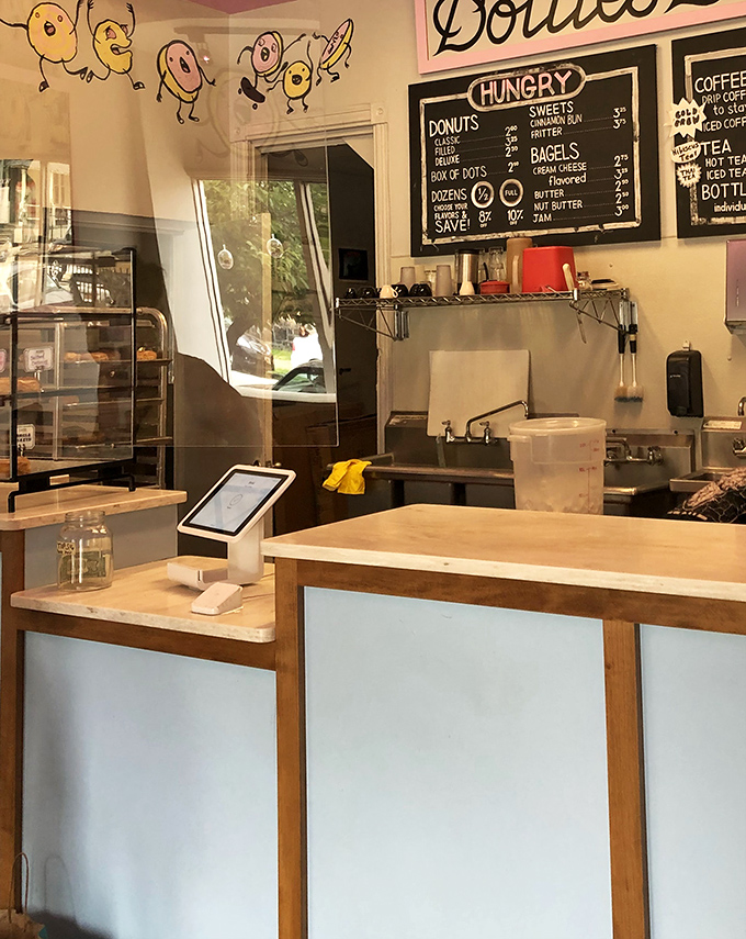 The command center of sweetness, where friendly staff guide newcomers through the delicious dilemma of what to order.