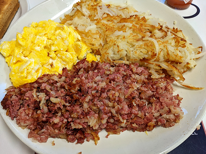 Corned beef hash with eggs and hash browns &ndash; the holy trinity of breakfast that's been solving problems and starting days right since time immemorial.