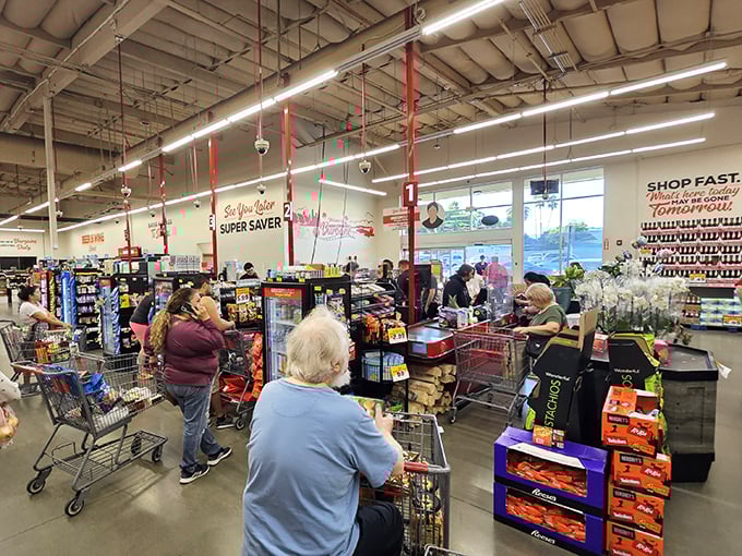 The final frontier: checkout lines where carts overflow with discoveries and wallets remain surprisingly intact. Grocery archaeology at its finest.