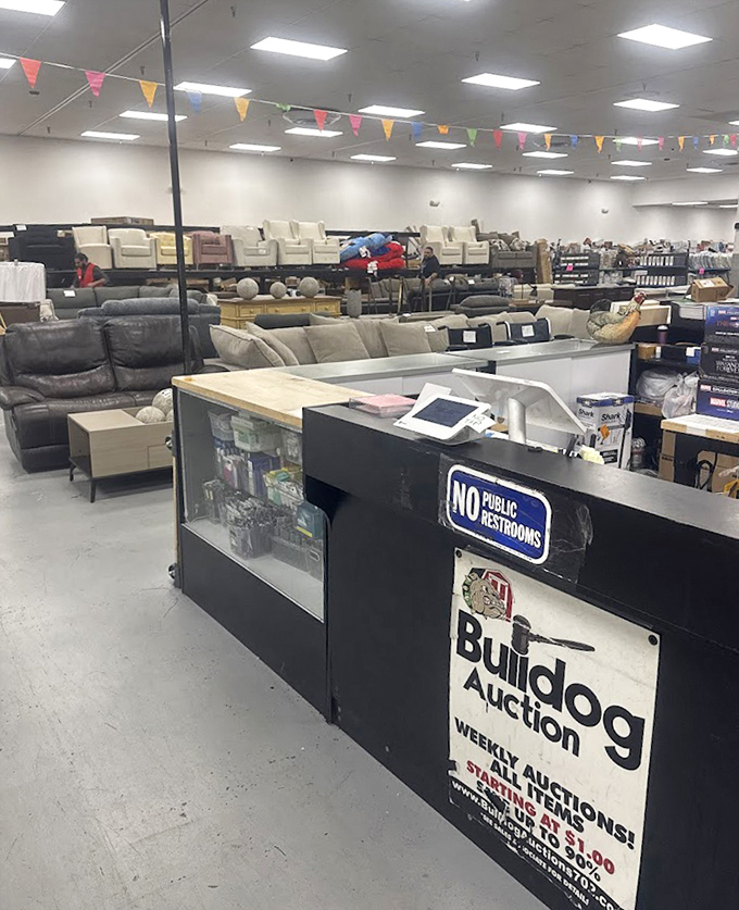 The checkout counter where dreams of savings become reality and your trunk's capacity gets seriously tested today.