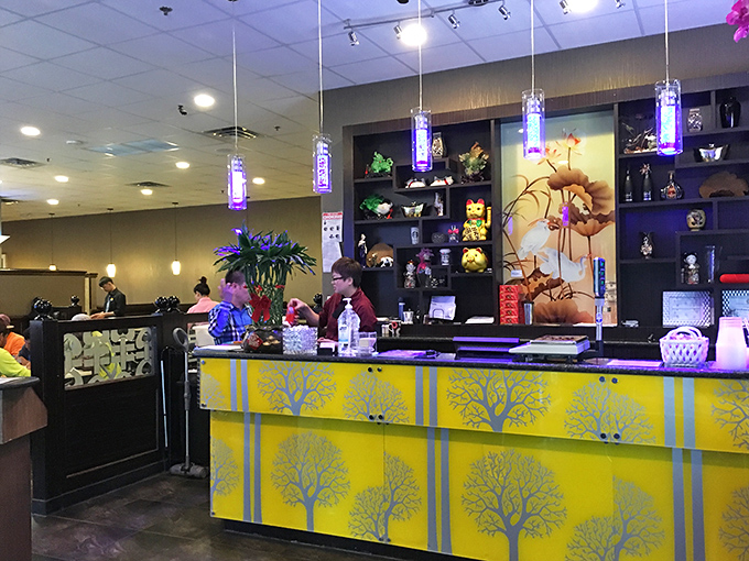 The reception counter welcomes you with vibrant colors and the promise of culinary abundance. First impressions matter!