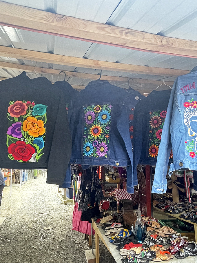 Denim gets decorated! Jackets transformed with colorful embroidery hang like wearable canvases above tables of footwear finds.