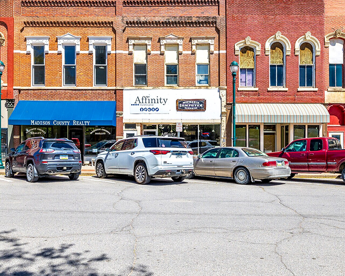 Historic buildings house thriving businesses where shopkeepers still remember your name and your preferences.