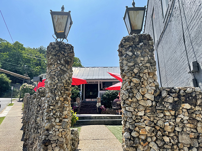 Stone pillars frame the entrance like breakfast gatekeepers welcoming you to morning glory and grits.