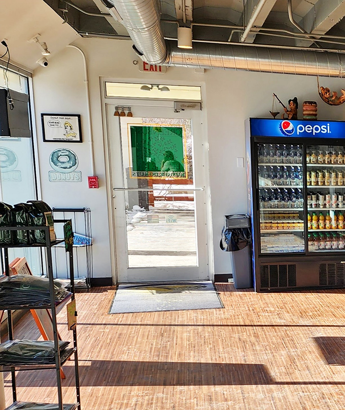 The exit door, where many have walked out happier than when they entered, carrying white boxes of joy to share. Or not.