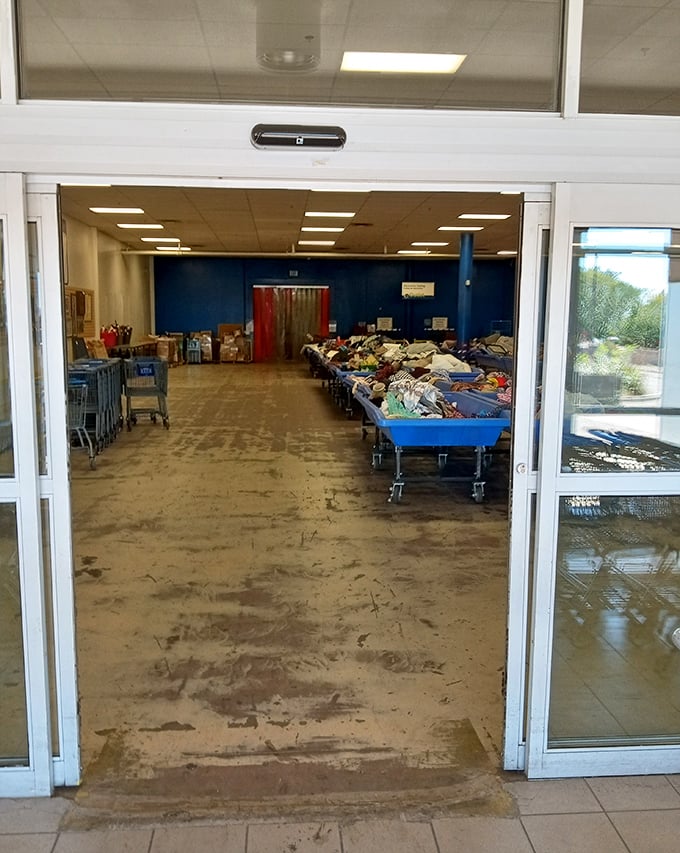 Behind these doors lies the sorting area where donations transform into merchandise. The retail equivalent of a butterfly's chrysalis stage.