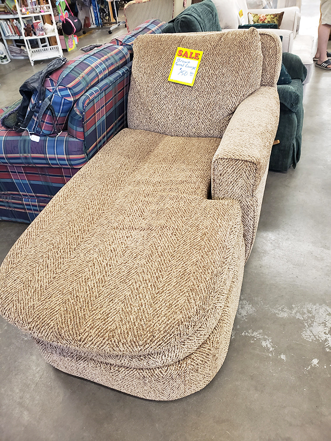 The perfect napping station awaits its new owner. This neutral-toned chaise lounge practically whispers, "Come, sit, stay awhile."