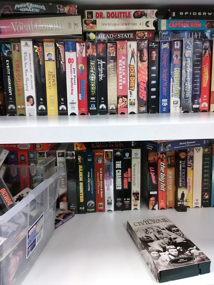 VHS tapes line the shelves like a time capsule of movie nights past&mdash;from "Dr. Dolittle" to "Spider-Man" for nostalgic collectors.
