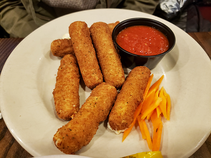 Mozzarella sticks: the universal language of "yes, I deserve this golden-brown moment of cheese-pulling joy" that transcends all barriers.
