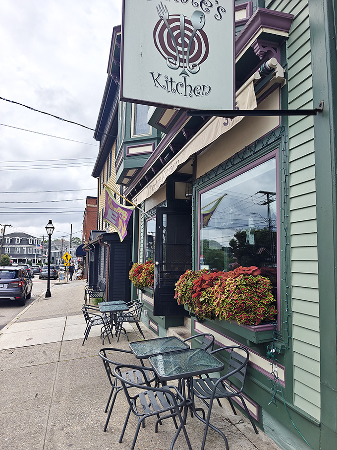 Sidewalk seating surrounded by colorful flower boxes&mdash;because sometimes great breakfast needs fresh air and a side of East Greenwich charm.