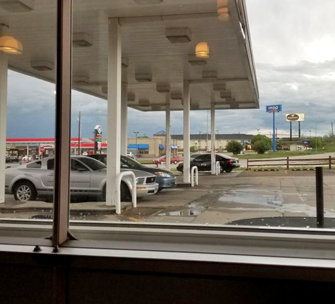 The view from inside reminds you that great food often hides in unexpected places. This former gas station now fuels people instead of cars.