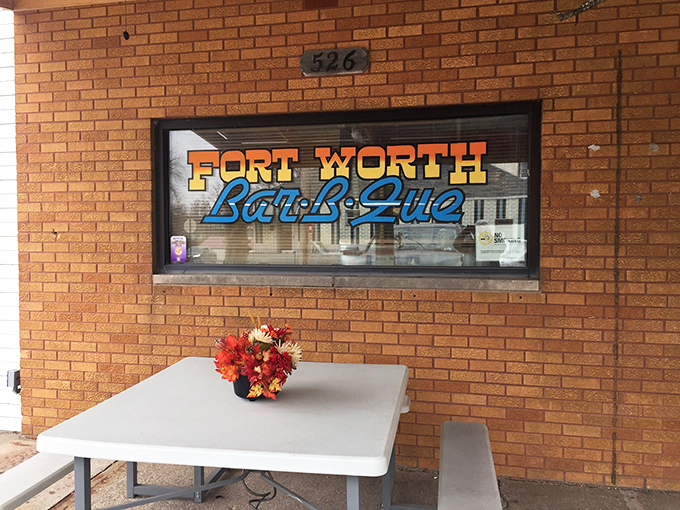 The window sign announces your arrival at flavor town. That picnic table outside? Perfect for when you're too impatient to make it home with takeout.