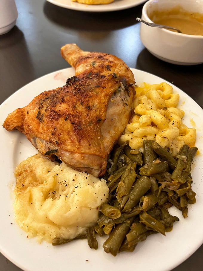 This roasted chicken leg has clearly been introduced to herbs and butter in a meeting that went exceptionally well for everyone involved.