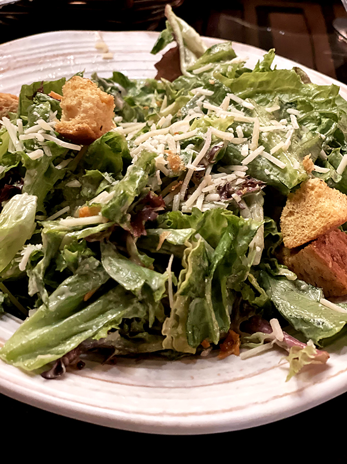 A Caesar salad that actually deserves its imperial name&mdash;crisp romaine, house-made croutons, and a dressing that Julius himself would approve.