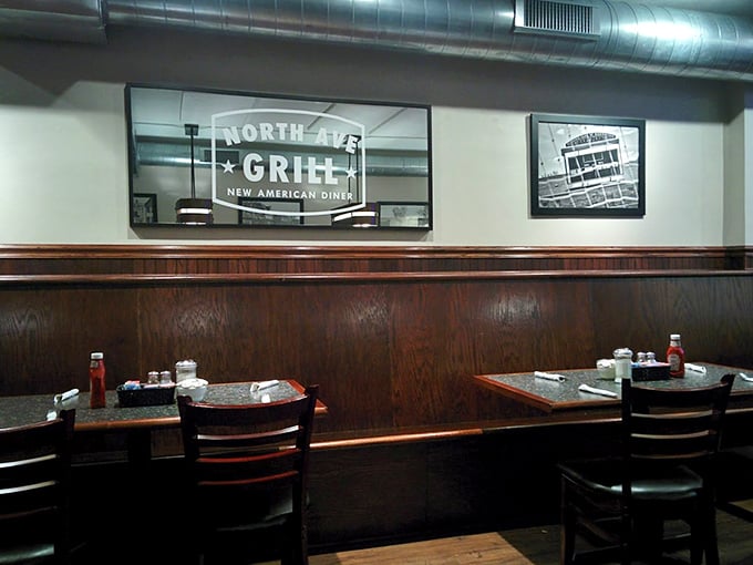 Dark wood paneling and simple tables create an atmosphere where the food, not the decor, takes center stage. Sometimes the best restaurants whisper rather than shout.