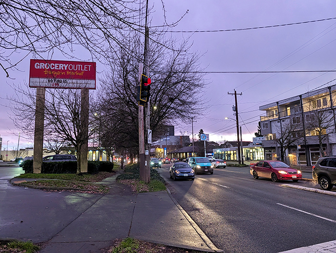 The beacon of bargains stands tall against the Seattle sky, guiding smart shoppers home like a thrifty North Star.