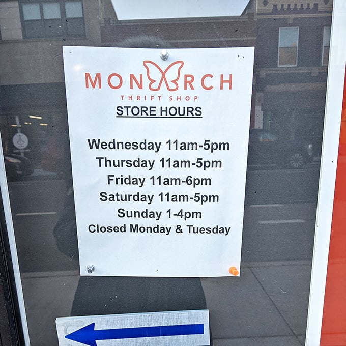 Store hours posted with the confidence of a place that knows you'll rearrange your schedule just to get your thrifting fix.