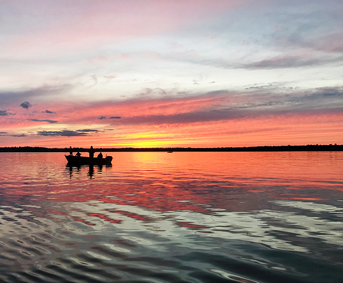 A sunset boat ride on Lake Bemidji paints the sky in colors so vivid you'll swear Mother Nature hired a Hollywood lighting director.