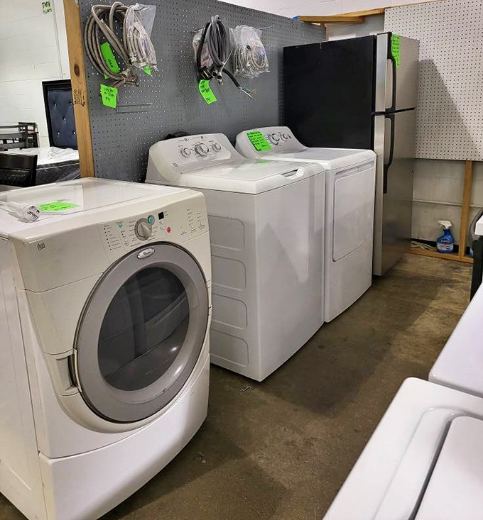 The appliance graveyard, where perfectly functional washers and dryers await resurrection in new homes. These clean machines have plenty of spin cycles left in them.
