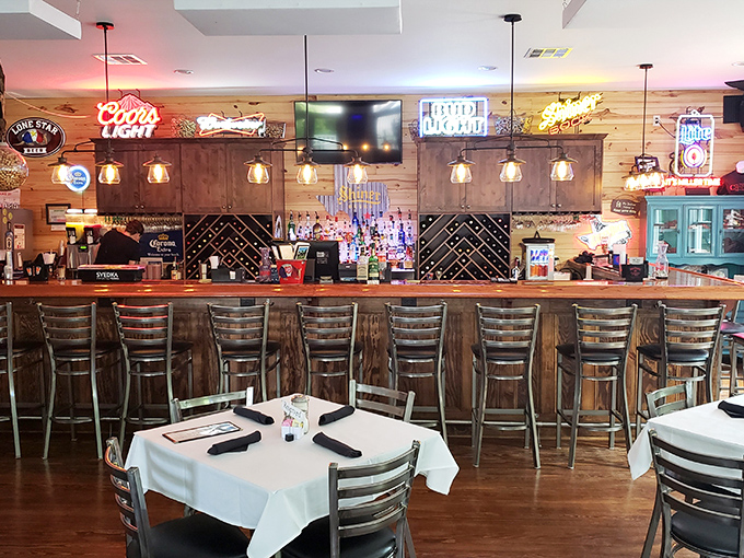 The bar glows with inviting warmth, promising craft cocktails that might just summon your courage before exploring the rest of this haunted gem.