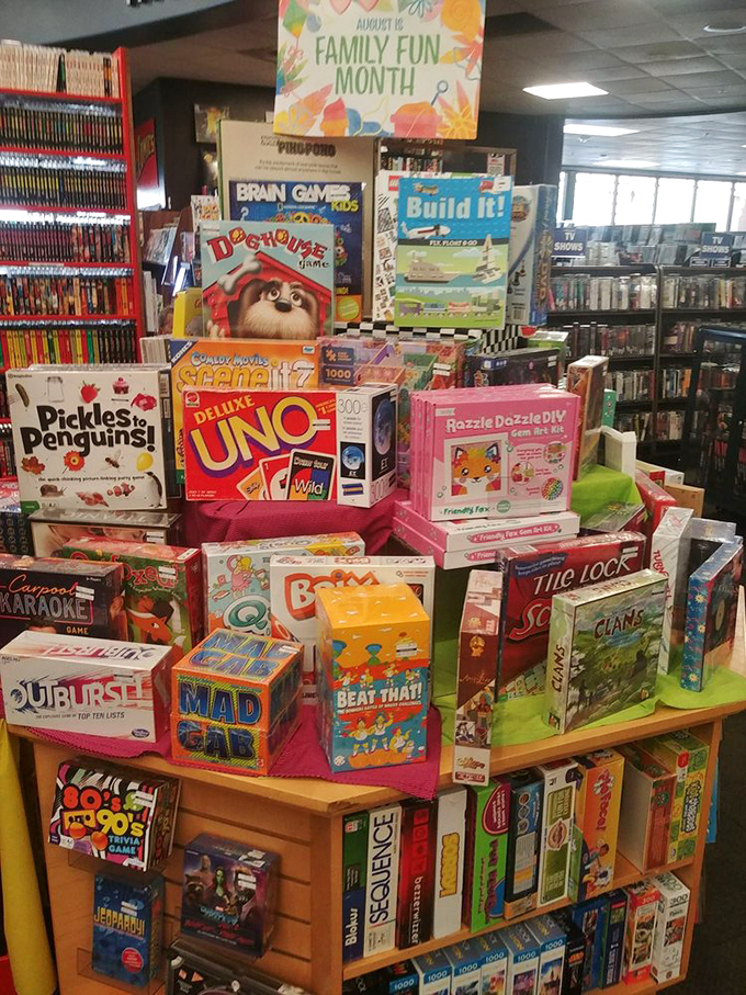 Board game heaven for family game nights! From classic UNO to quirky "Pickles to Penguins," these boxes contain hours of competitive fun.