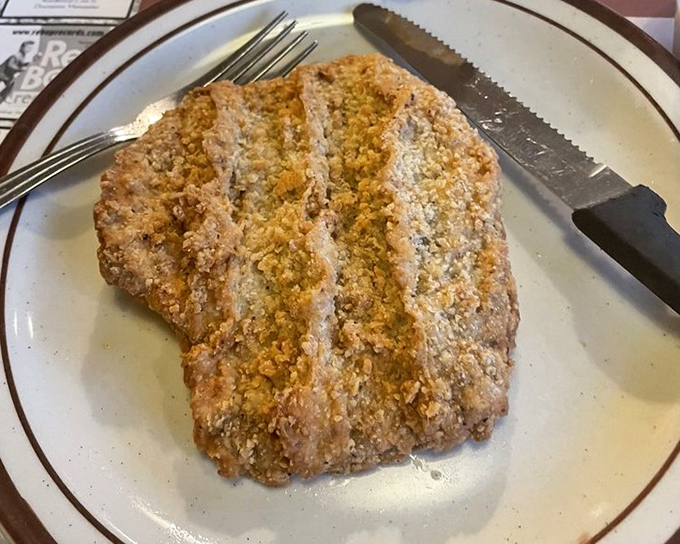 Chicken fried steak that could make a vegetarian question their life choices &ndash; golden, crispy, and waiting for your fork's first satisfying crunch.