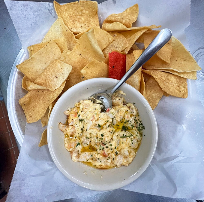 This crab and shrimp dip with tortilla chips isn't just an appetizer&mdash;it's the beginning of a beautiful friendship between seafood and corn.