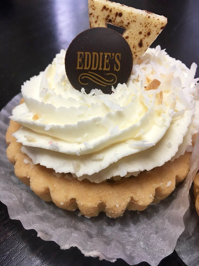 This coconut-topped tart isn't just dessert&mdash;it's edible architecture. The chocolate medallion serves as both decoration and delicious signature.