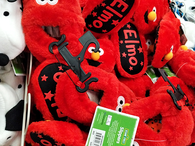 Elmo slippers with eyes that follow you around the store, silently judging your other purchases while simultaneously begging to come home with you.