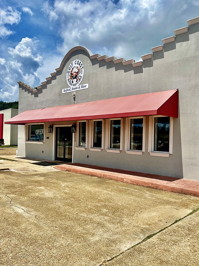 Gulf Coast Seafood brings ocean treasures inland, proving geography shouldn't limit good eating. That red awning signals salvation for landlocked seafood lovers everywhere.