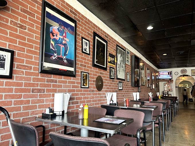 The dining room where barbecue memories are made, with brick walls that have absorbed decades of satisfied sighs and happy conversations.