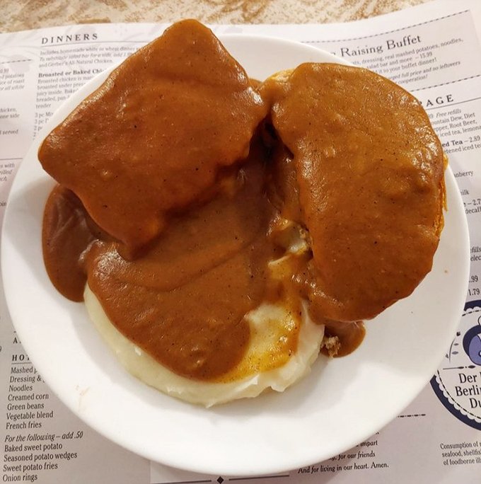 Meatloaf smothered in gravy over mashed potatoes&mdash;comfort food that gives you a warm hug from the inside out.