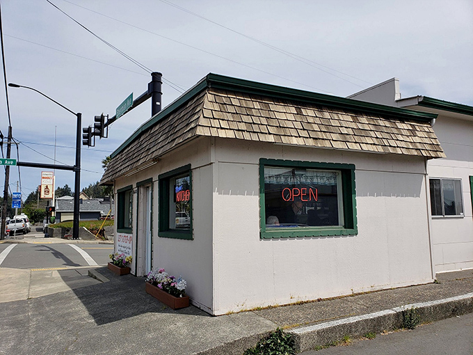 Situated on a corner with its neon "OPEN" sign glowing like a beacon to hungry travelers &ndash; Mom's Kitchen doesn't hide, but you have to know to look.